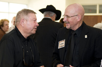 "[President's Circle] Photograph of Dr. Robert Nelsen Interacting With ...